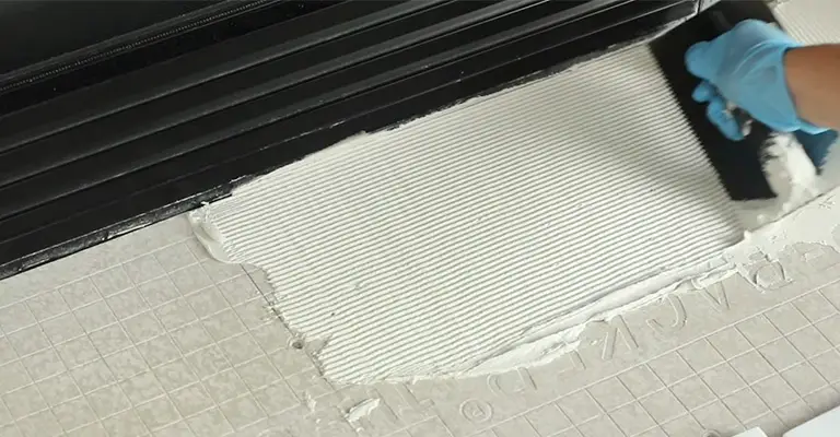 DIY Fireplace Upgrade: Tiling Over Marble for a Modern Look