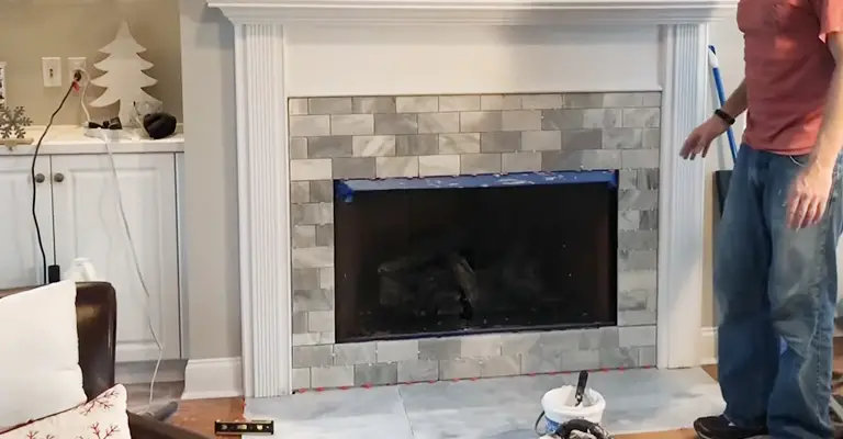 DIY Fireplace Upgrade: Tiling Over Marble for a Modern Look