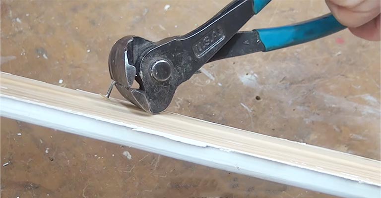 A Handy Fix: How to Cover Those Pesky Nails Sticking Out of Wood